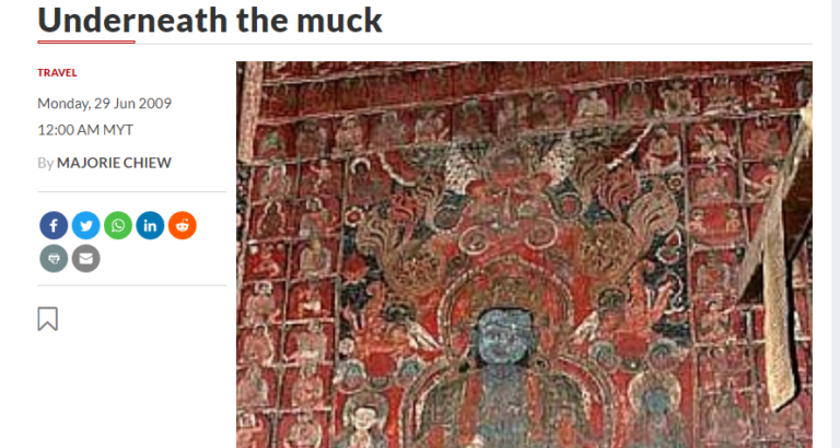 Underneath the muck lay age-old Buddhist paintings